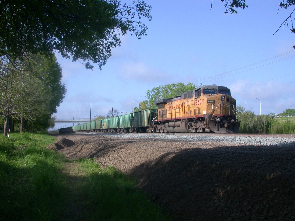 UP 6860 31Mar2010 NB on the side with Ballast at SNEED